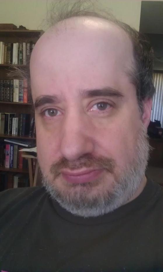 Brian Hartman (Author of Rolled)