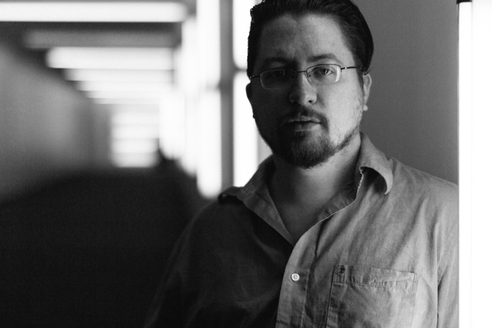 Justin D. Herd (Author of Of Gods and Madness)