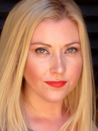 Julie Benson (Author of Batgirl and the Birds of Prey, Vol. 1)