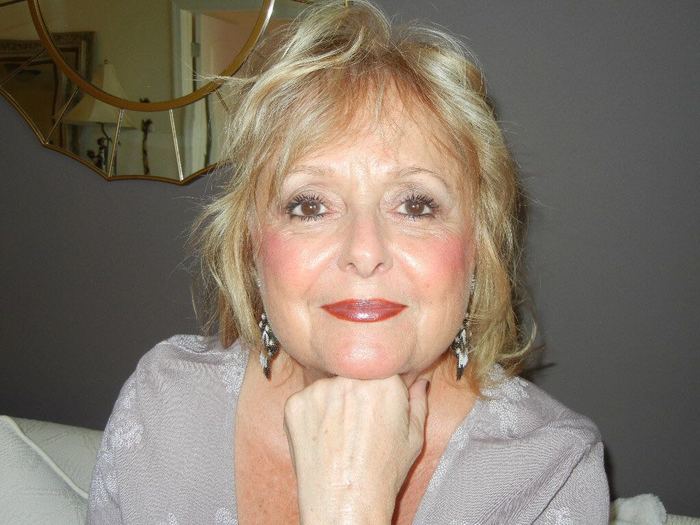 Caryn M. McGill (Author of Regrets)