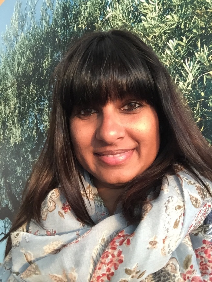 Nisha Paul (Author of Traveling Light)