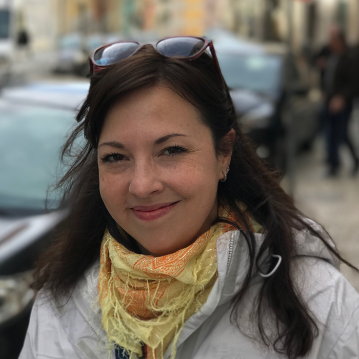 Emily Senecal (Author of Strangers on This Road)