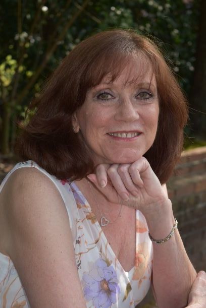 Sandy Scherer (Author of Saving Grace)