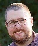 Justin Monroe (Author of Zee Locked-In)