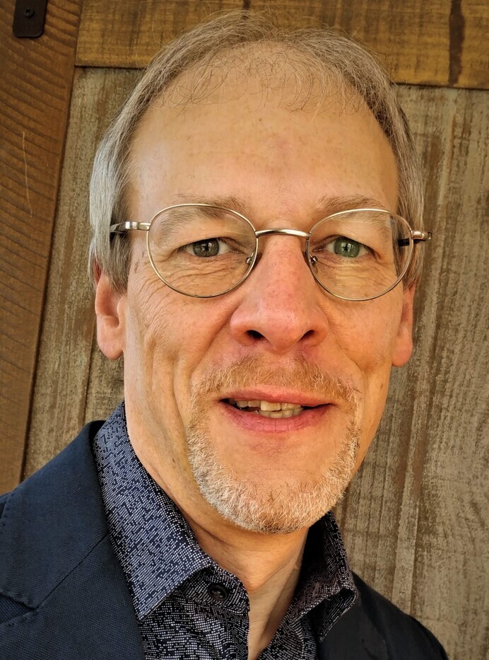 William E. Noland (Author of Playing with Fire)