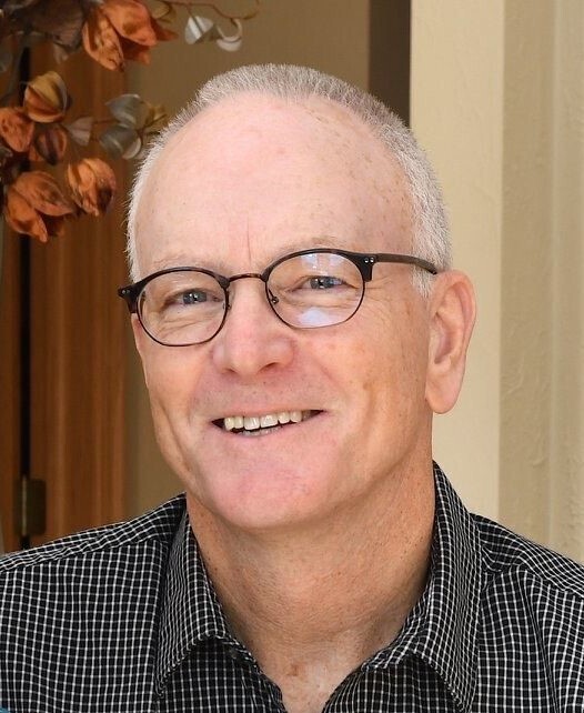 Mark Crawford (Author of Divided Loyalty)