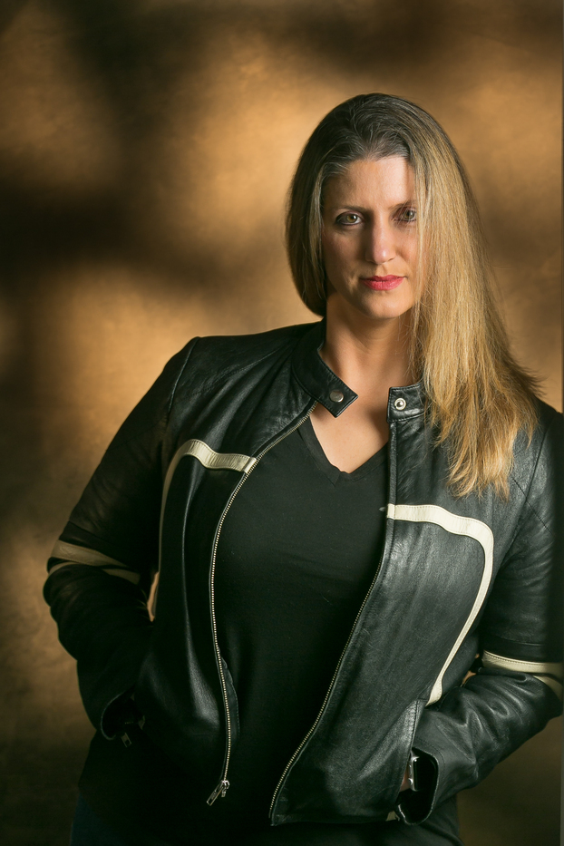 A.M. Adair (Author of Shadow Game)