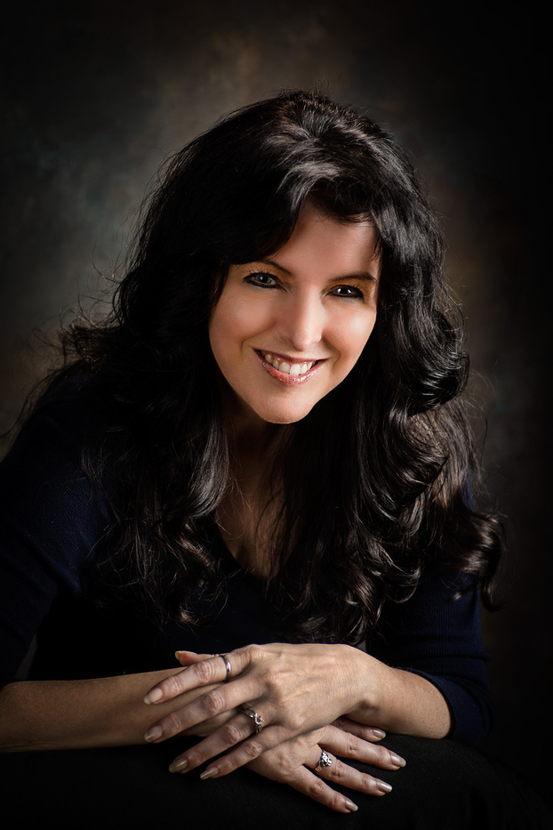 Laura Hetzel (Author of Its Own Defense)