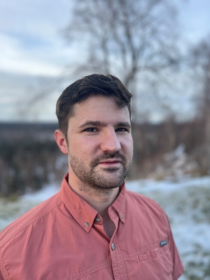 Travis McCaughey (Author of Crude Communication)