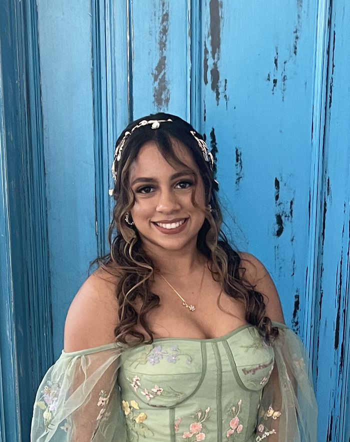 Desiree Peralta (Author of Between Dreams and Darkness)